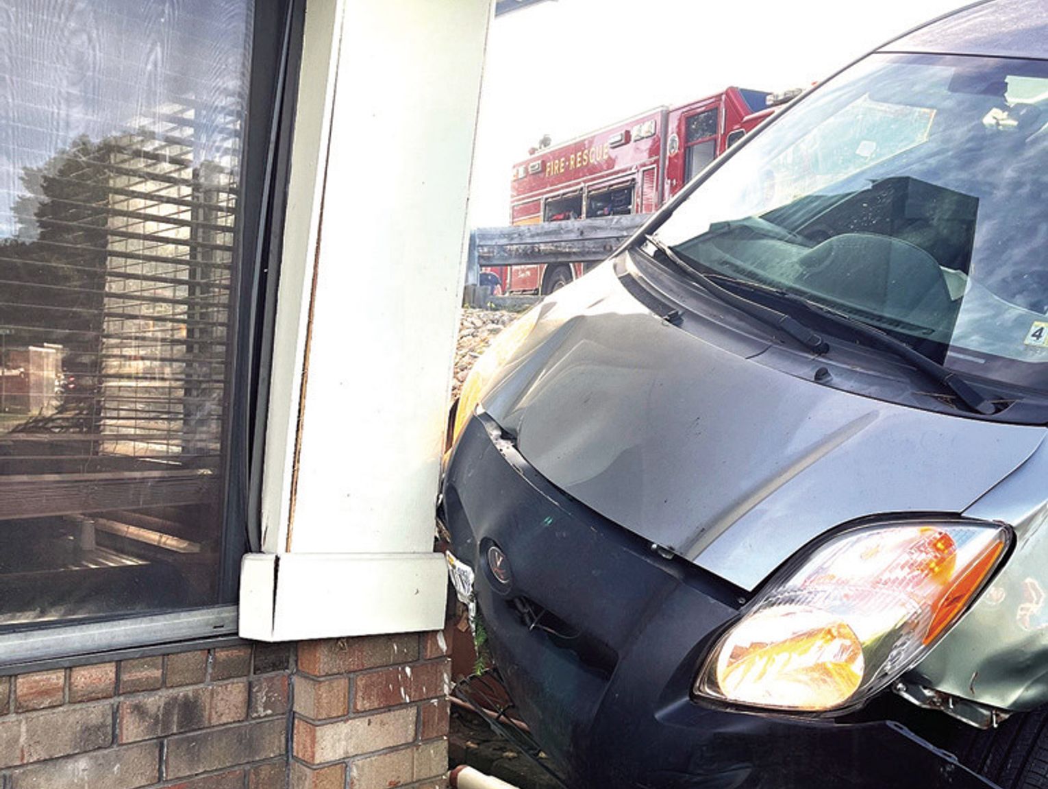 Car Goes Airborne, Strikes Building