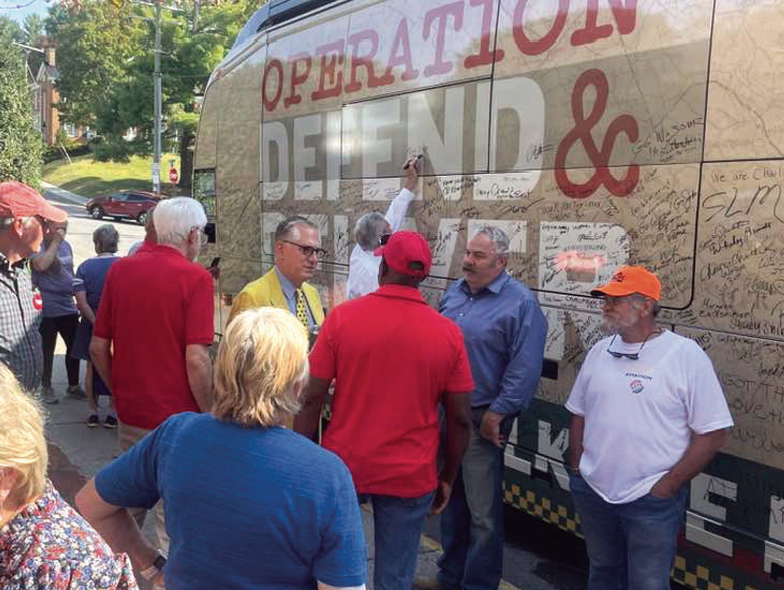 GOP Campaign Bus Stop Draws Protest